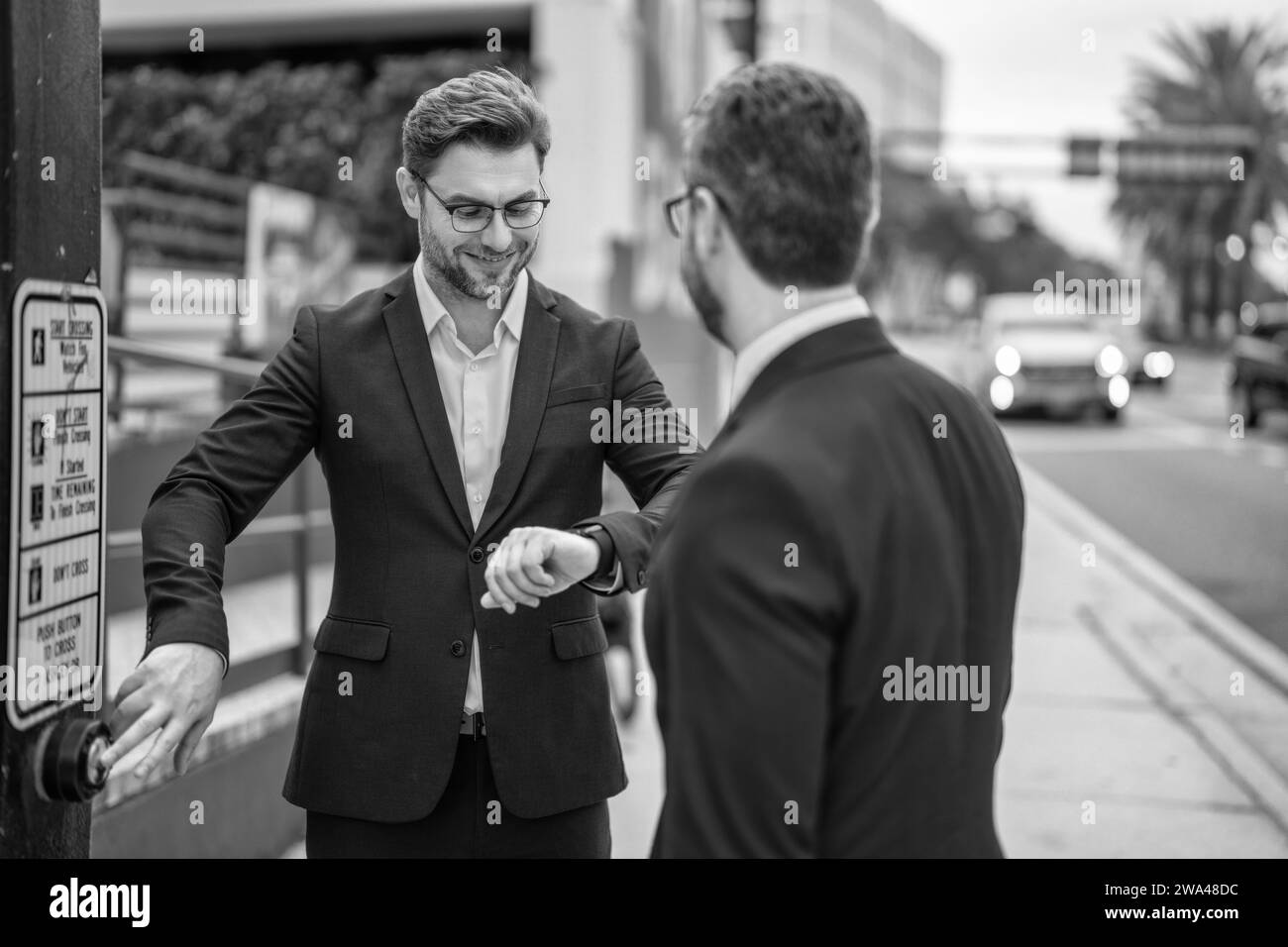 Suit check time Black and White Stock Photos & Images - Alamy