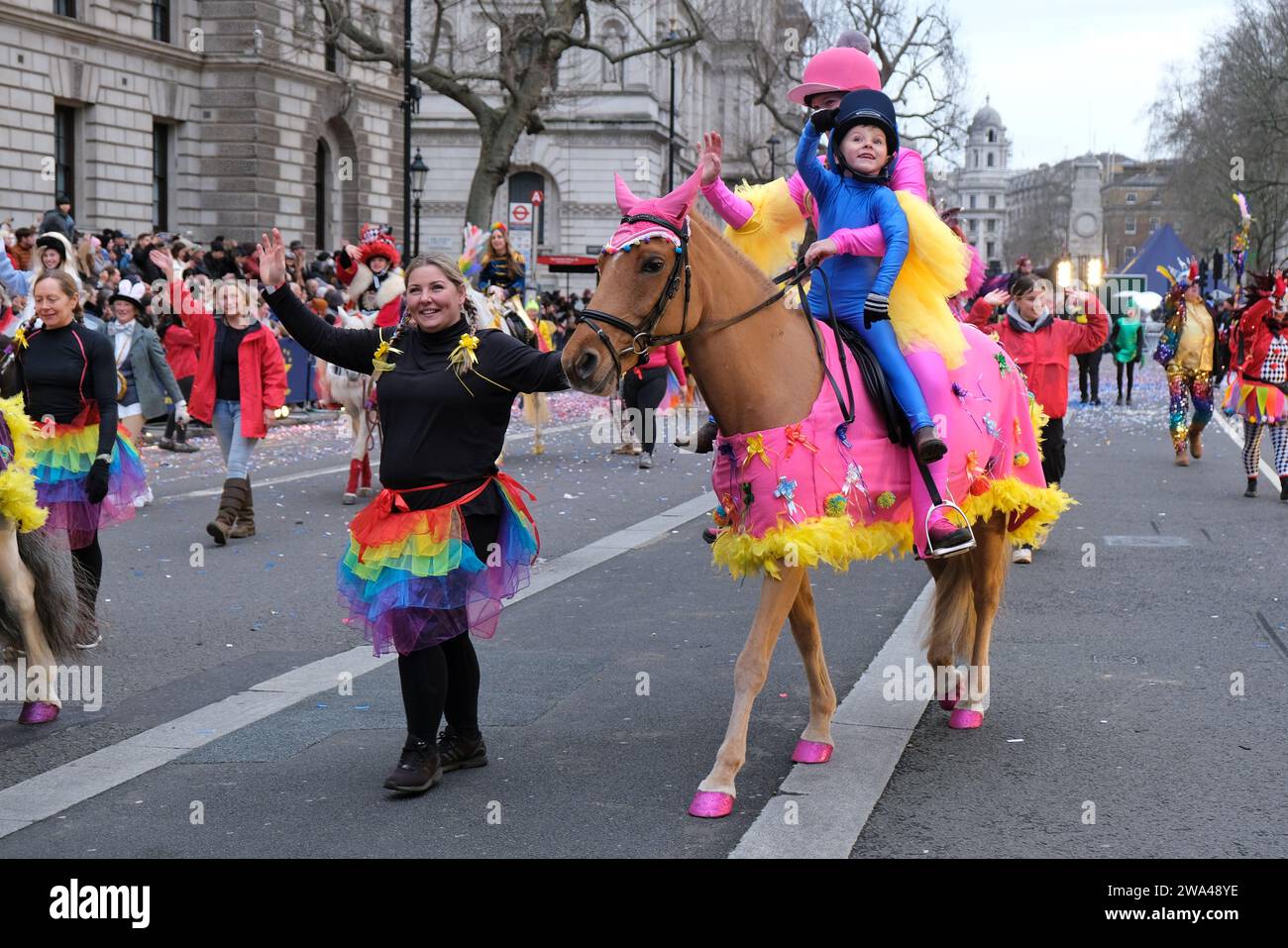 London, UK. 1st January, 2024. Crowds in London gather to watch the London New Year's Day Parade ...