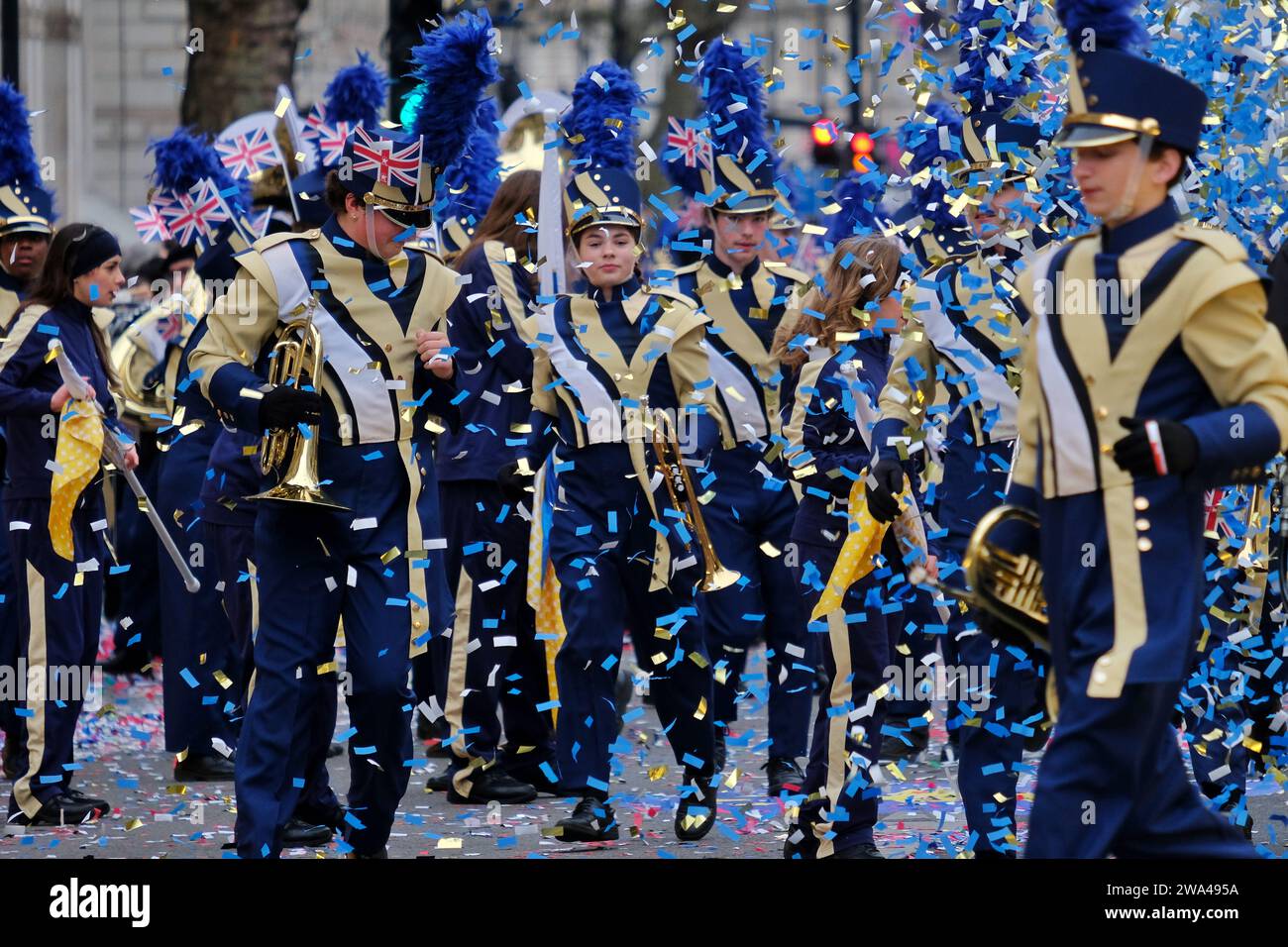 London, UK. 1st January, 2024. Crowds in London gather to watch the London New Year's Day Parade ...
