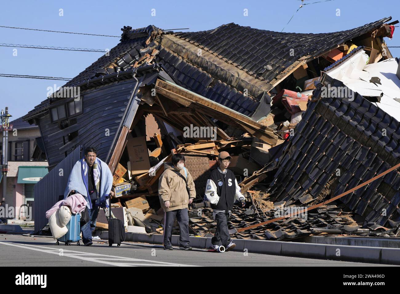 Photo taken on Jan. 2, 2024, shows a collapsed building in Wajima in ...