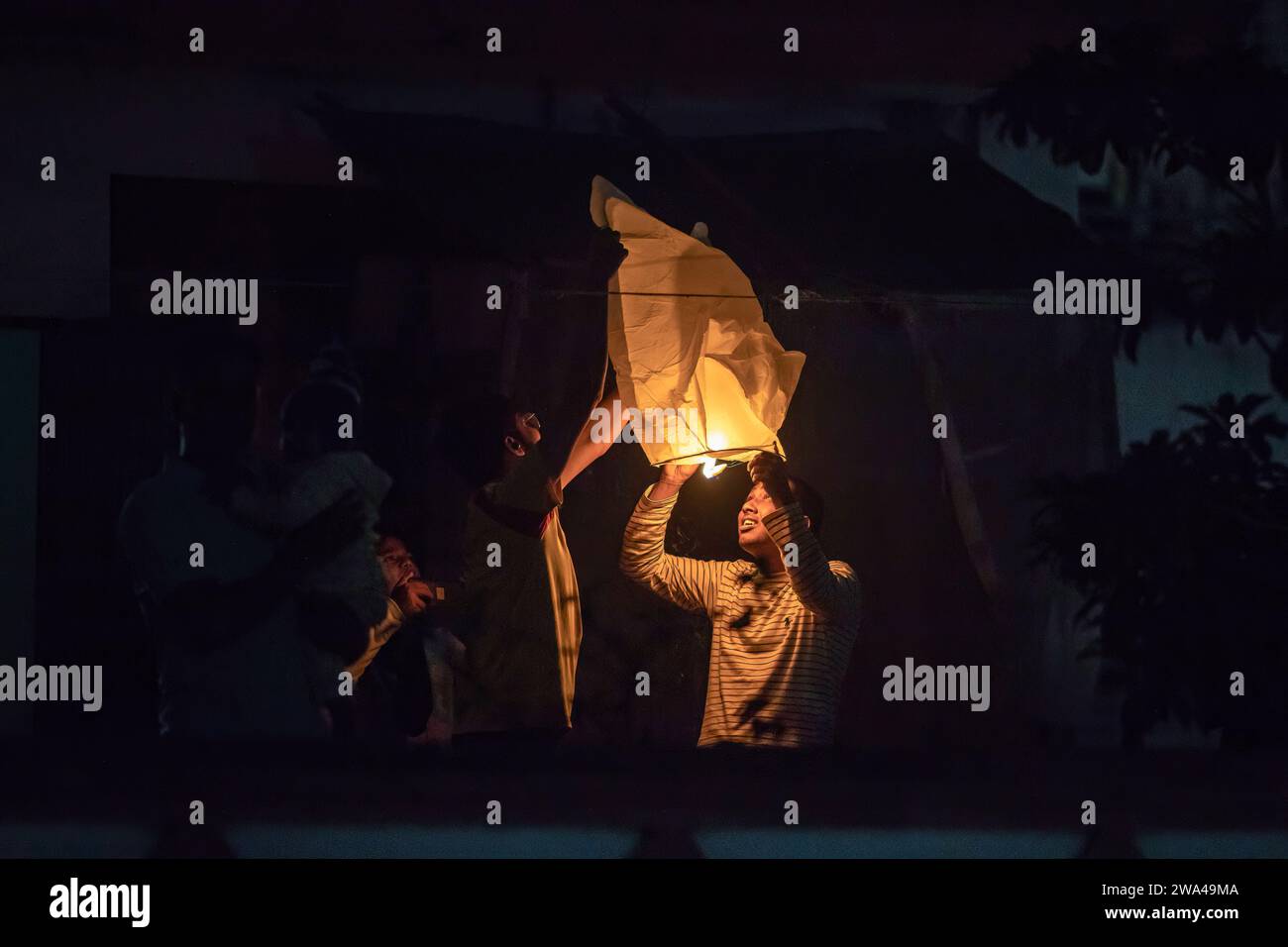 Dhaka, Bangladesh. 01st Jan, 2024. Residents seen flying paper lantern ...