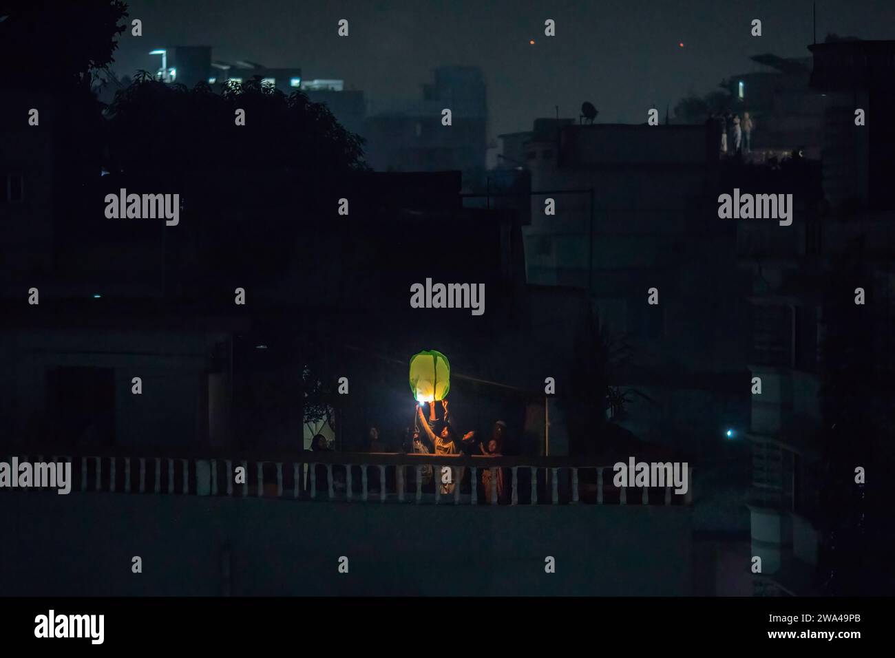 Dhaka, Bangladesh. 01st Jan, 2024. Residents seen flying paper lantern ...