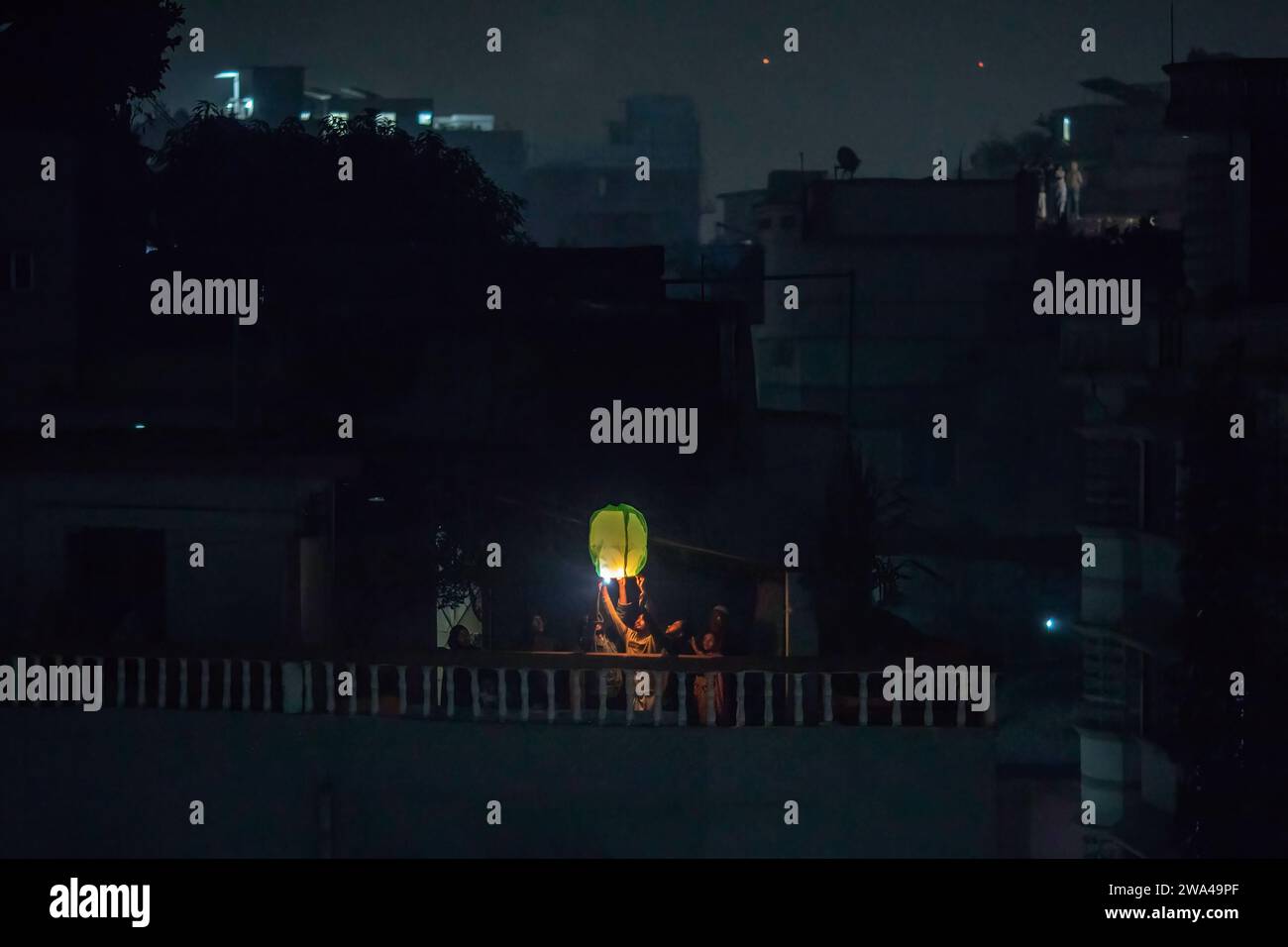 Dhaka, Bangladesh. 01st Jan, 2024. Residents seen flying paper lantern ...