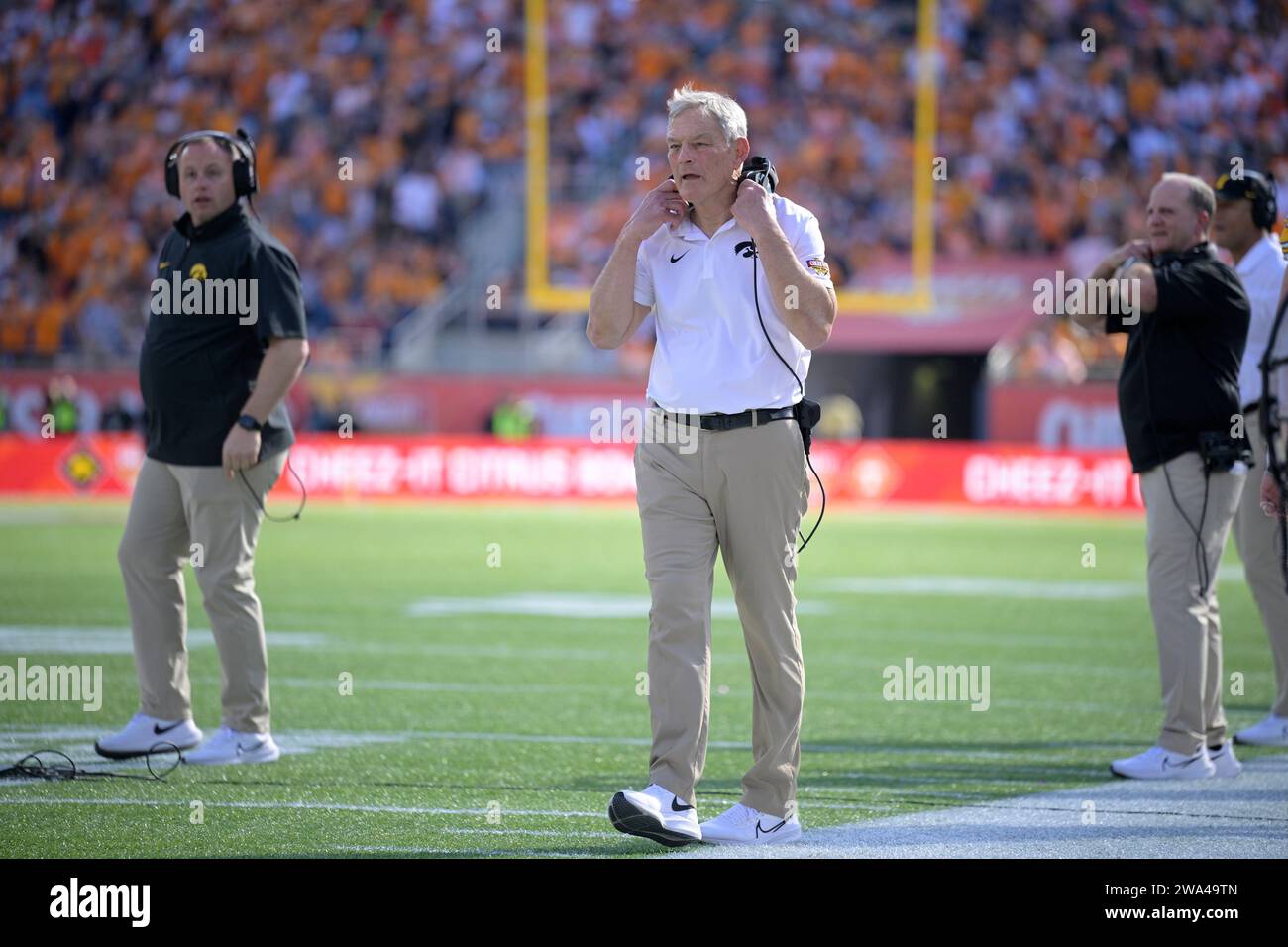Iowa head coach Kirk Ferentz, center, watches from the sideline during ...