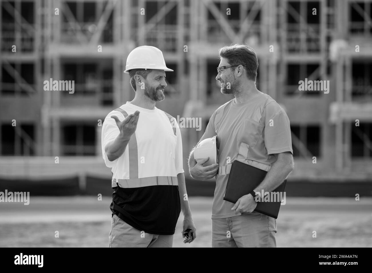 photo of architect men with construction project. architect men with ...