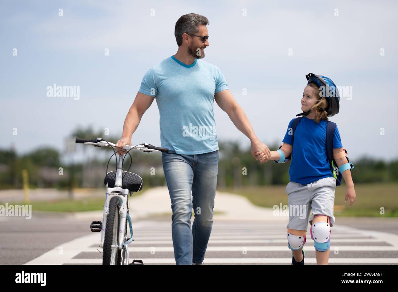 Kids insurance. Safety on road. Pedestrian crossing for cyclists. Happy ...