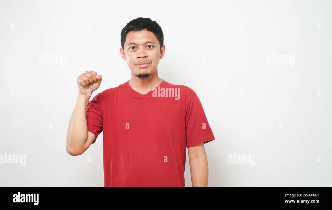 Asian man is using sign language with hand against white background ...