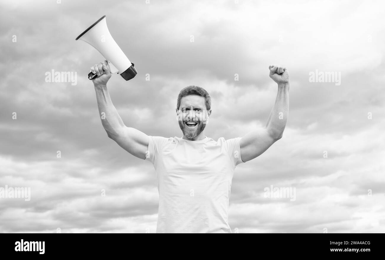 Man speaking in megaphone Black and White Stock Photos & Images - Alamy