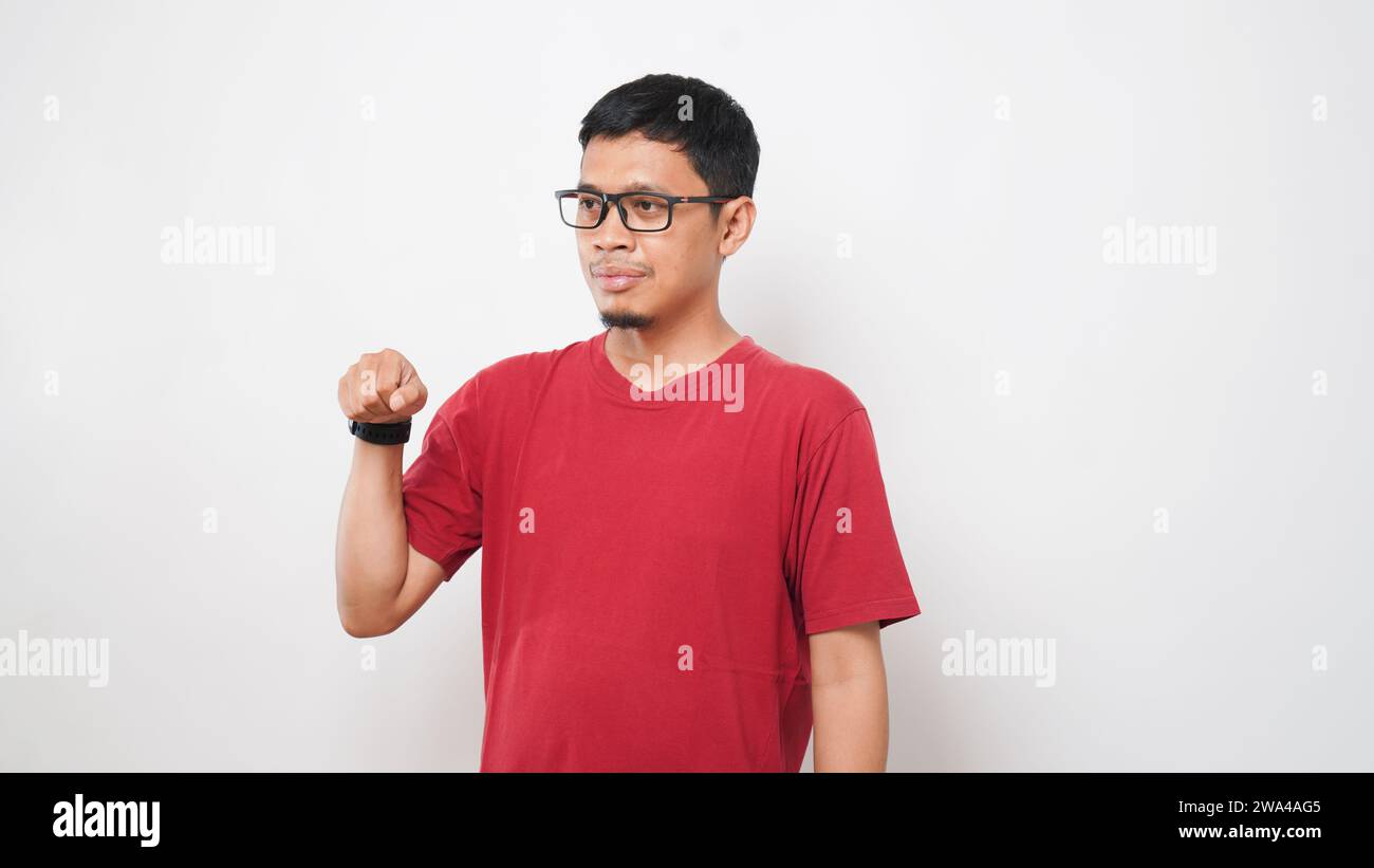 Asian man is using sign language with hand against white background ...