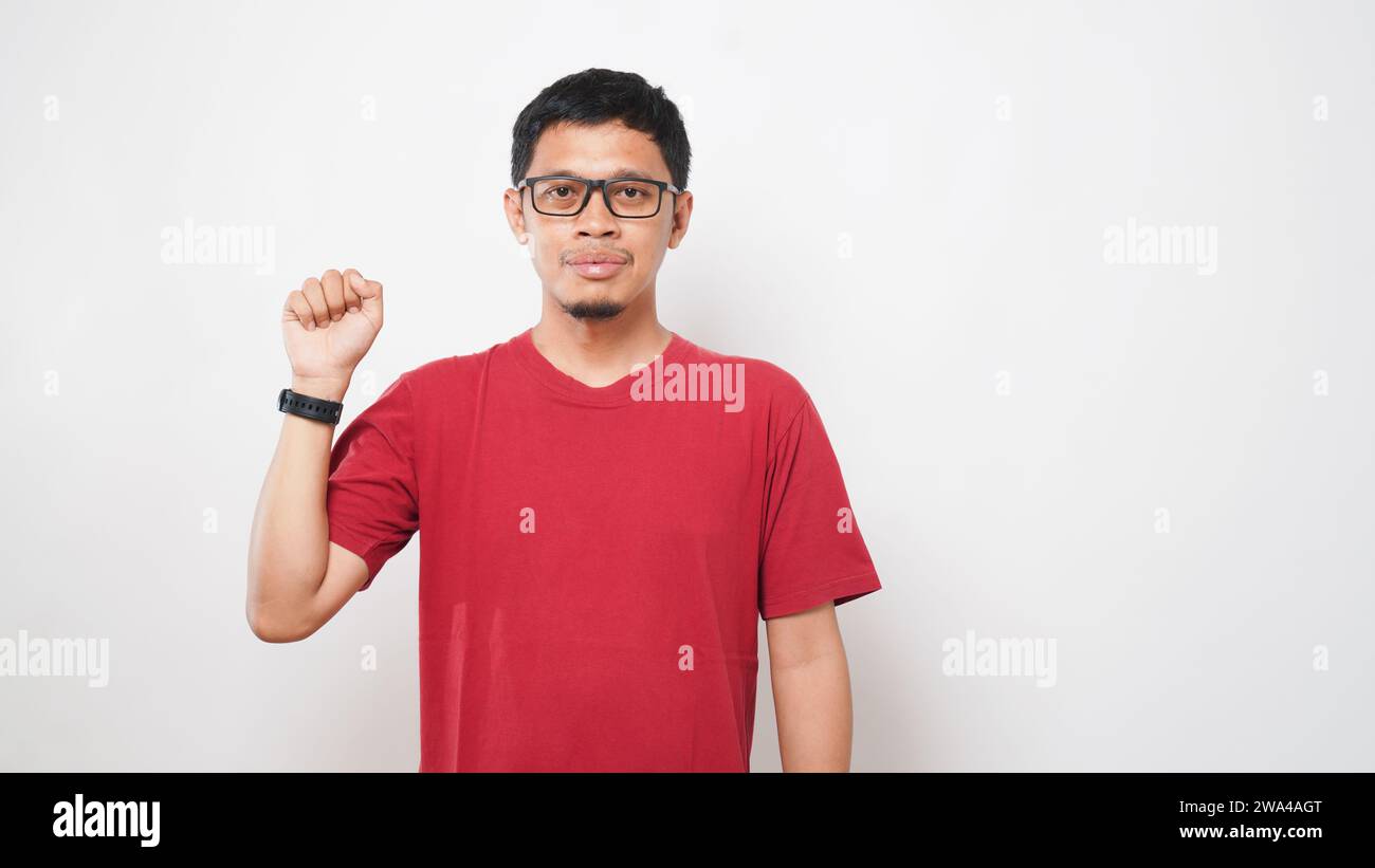 Asian man is using sign language with hand against white background ...