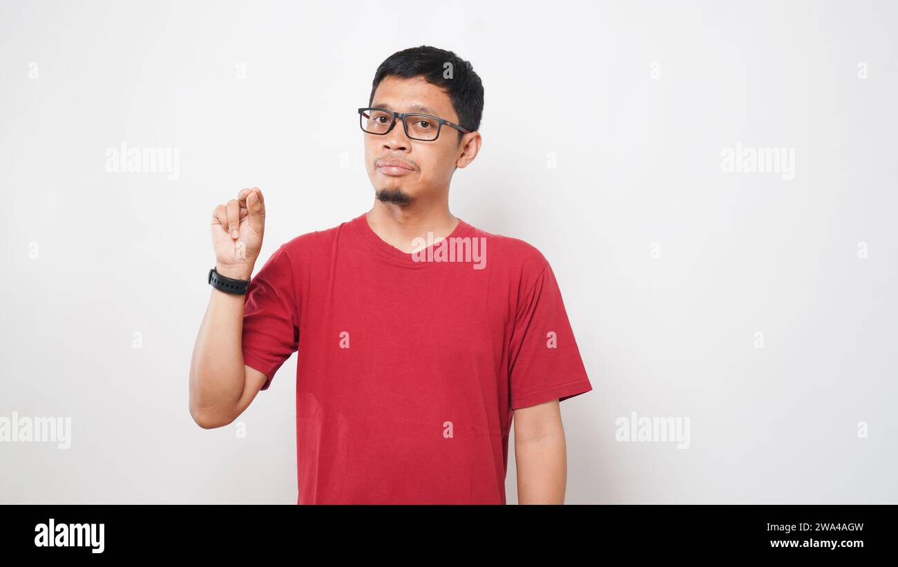 Asian man is using sign language with hand against white background ...
