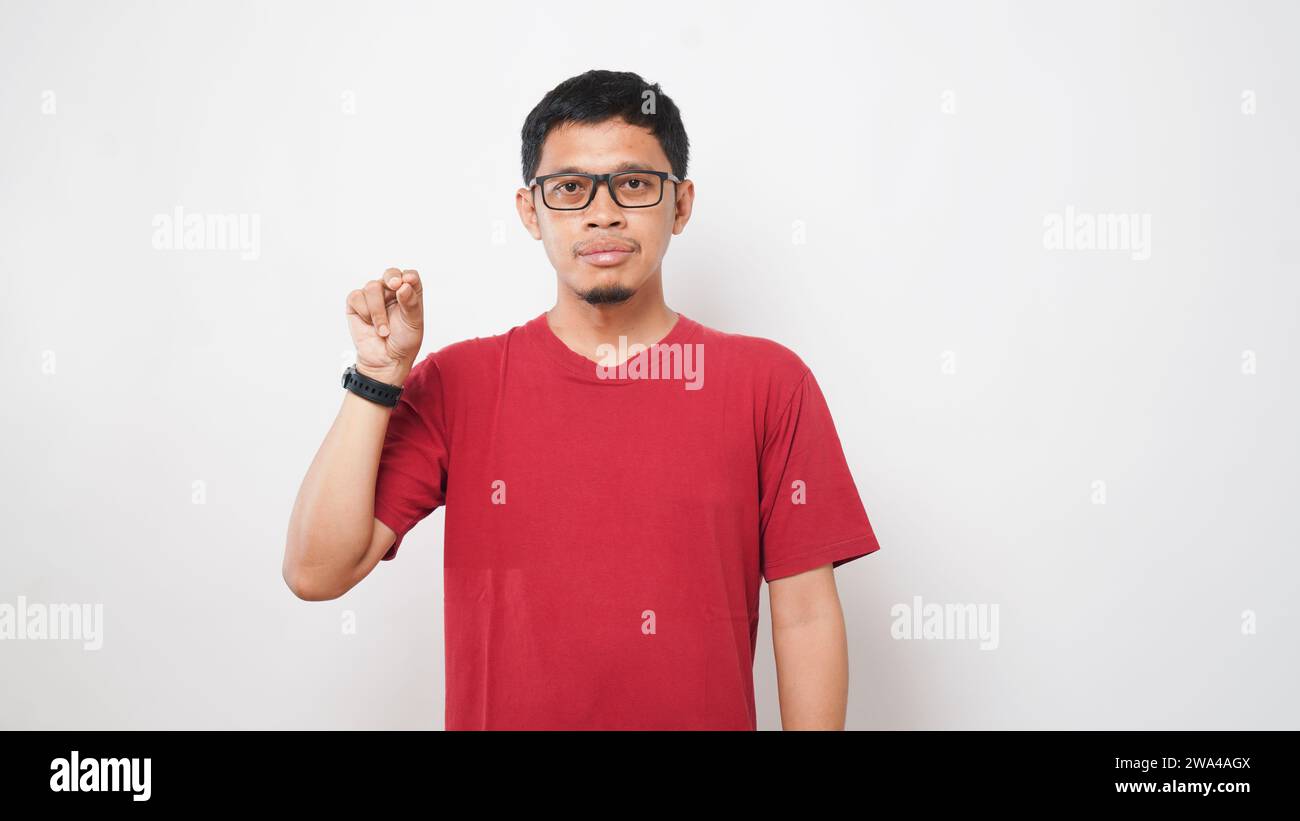 Asian man is using sign language with hand against white background ...