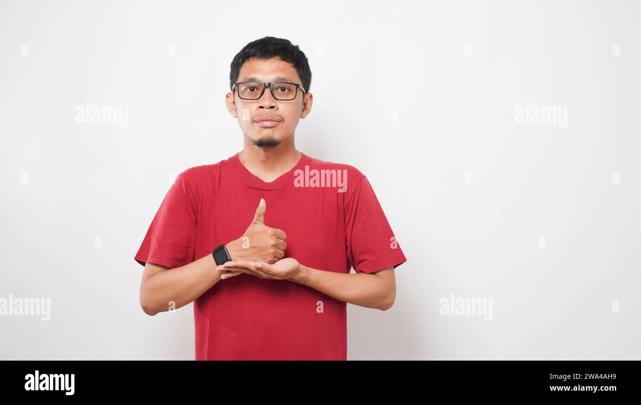 Asian man is using sign language with hand against white background ...