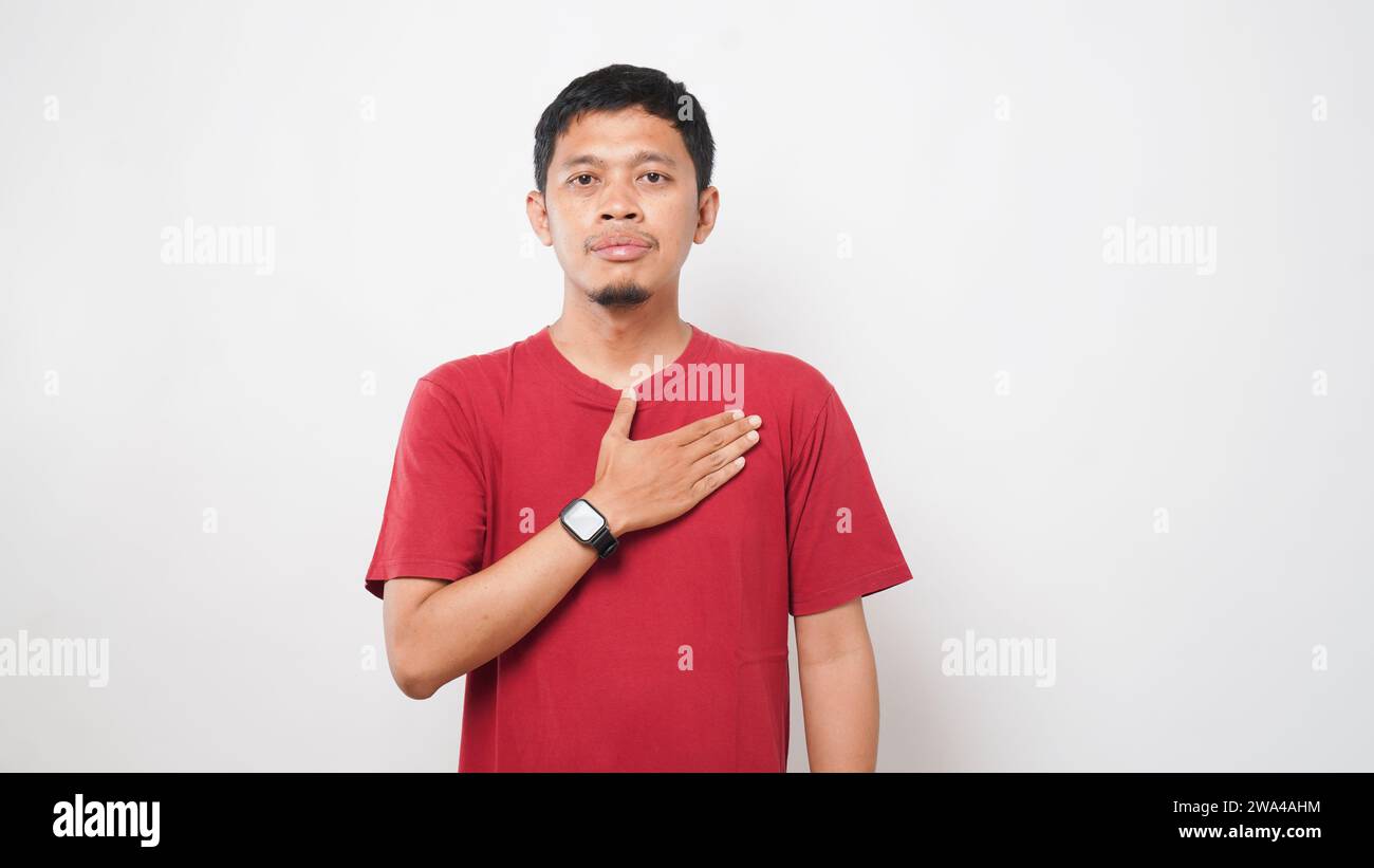 Asian man is using sign language with hand against white background ...