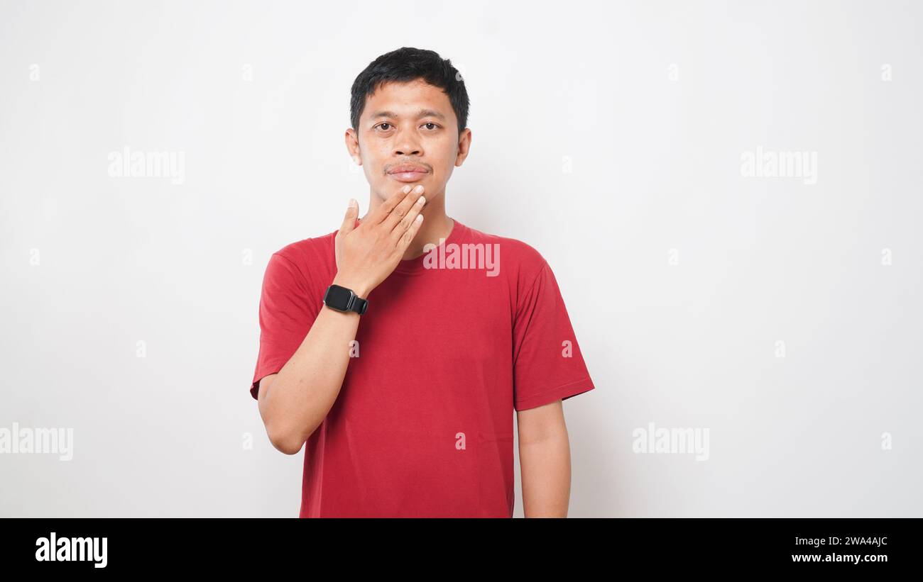 Asian man is using sign language with hand against white background ...