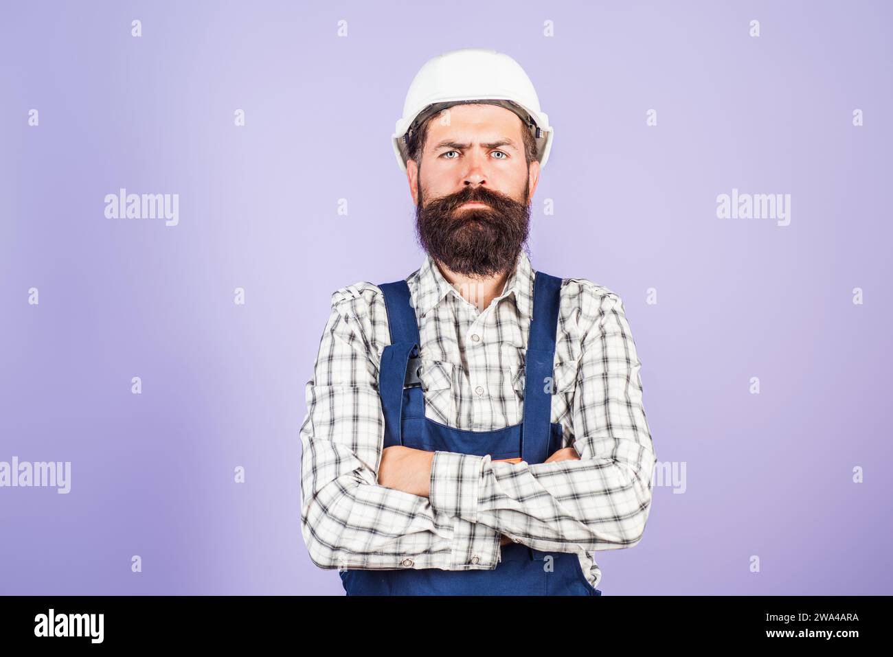 Builder in hardhat. Builder with helmet. Worker builder in helmet at ...