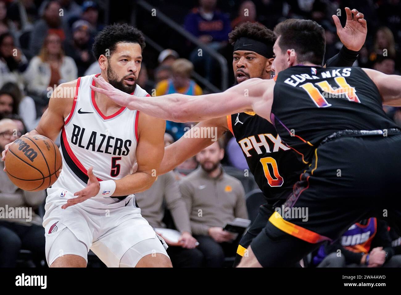 Portland Trail Blazers' Skylar Mays (5) gets double-teamed by Phoenix ...
