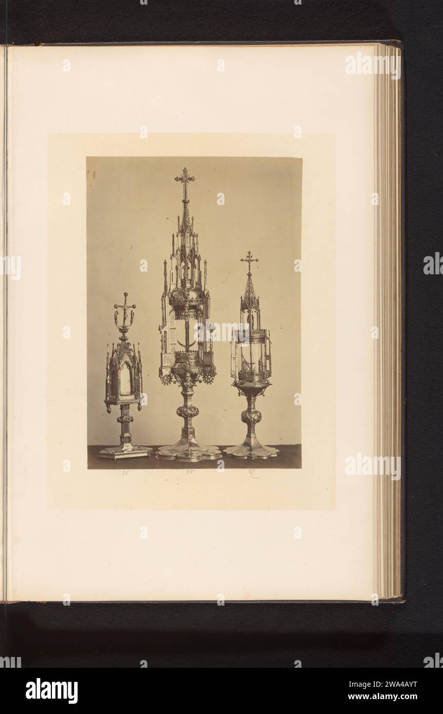 Three metal monstrances, prepared at an exhibition on religious objects ...