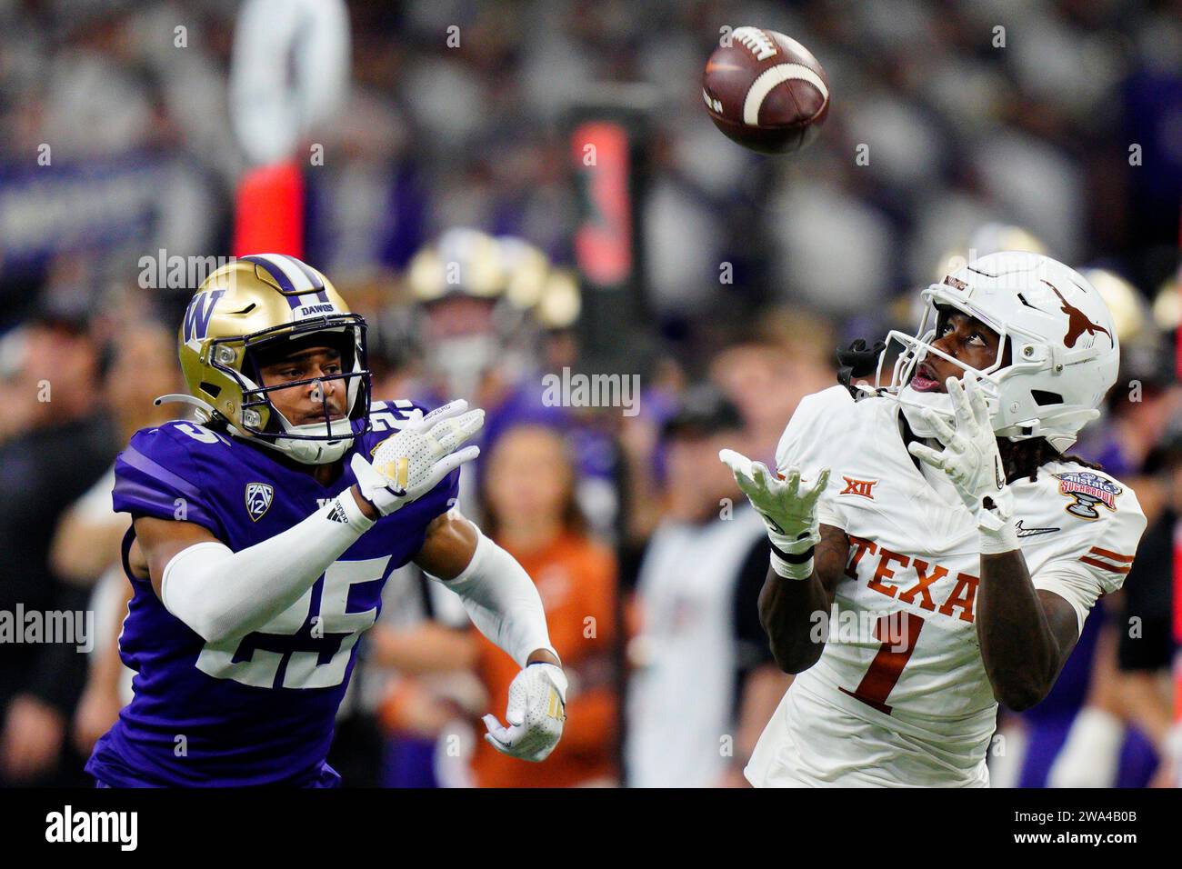 Texas wide receiver Xavier Worthy (1) prepares to make the catch ...