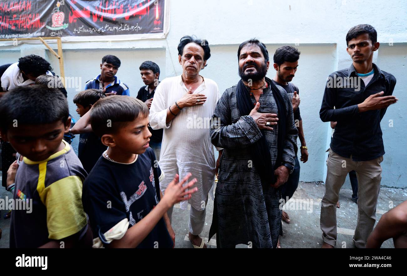 Shia men flogging themselves during the Muharram mourning festival of ...