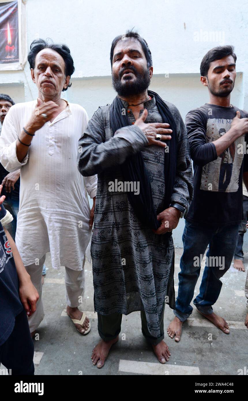 Shia men flogging themselves during the Muharram mourning festival of ...