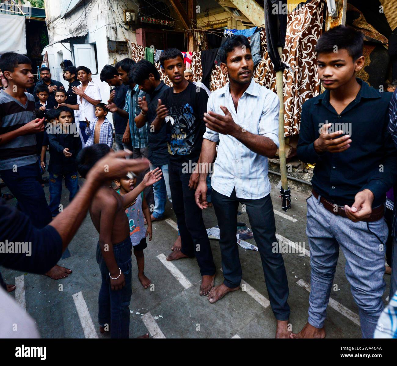 Shia men flogging themselves during the Muharram mourning festival of ...