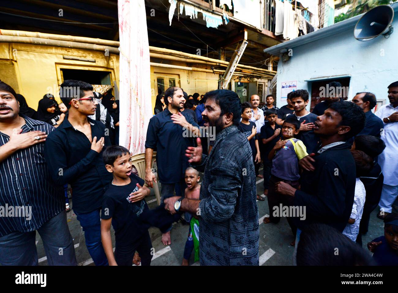 Shia men flogging themselves during the Muharram mourning festival of ...