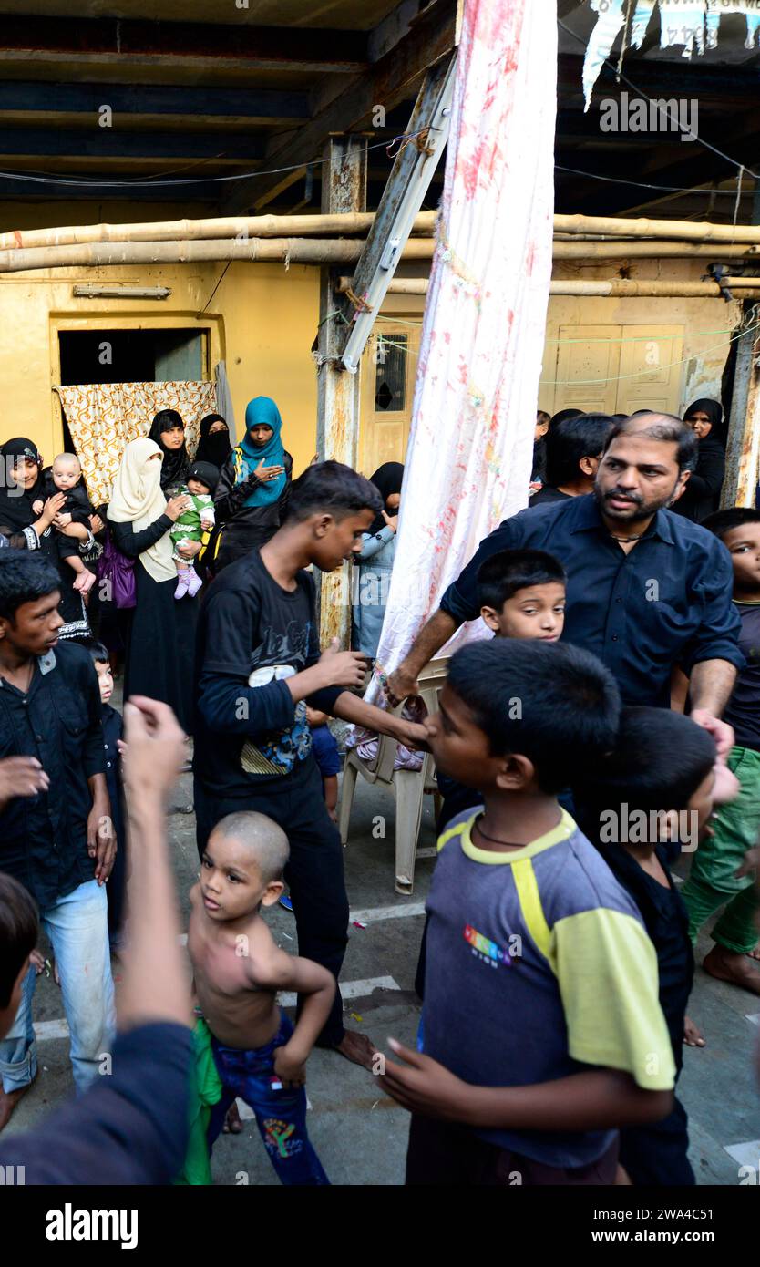Shia men flogging themselves during the Muharram mourning festival of ...