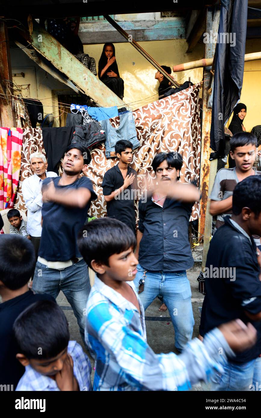 Shia men flogging themselves during the Muharram mourning festival of ...