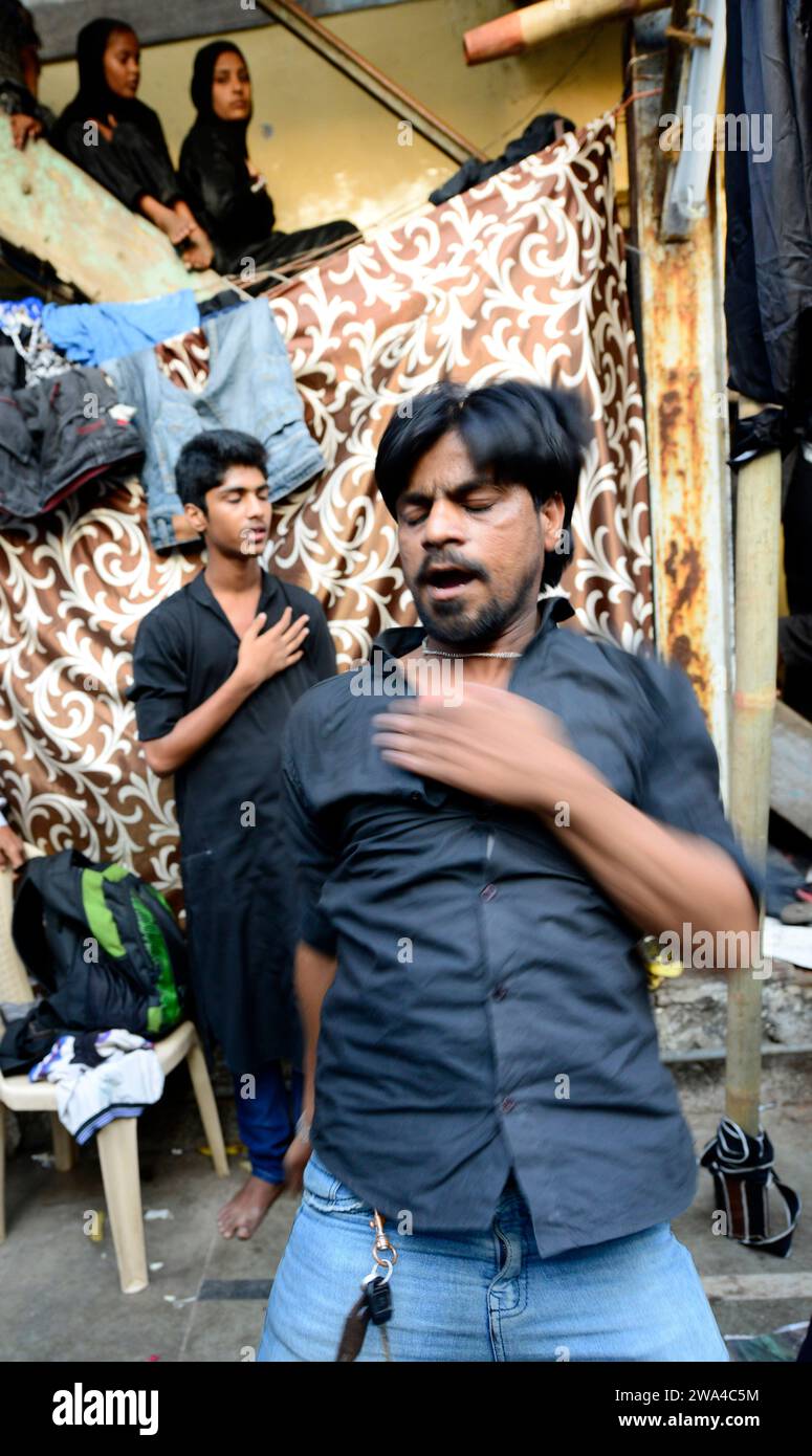 Shia men flogging themselves during the Muharram mourning festival of ...