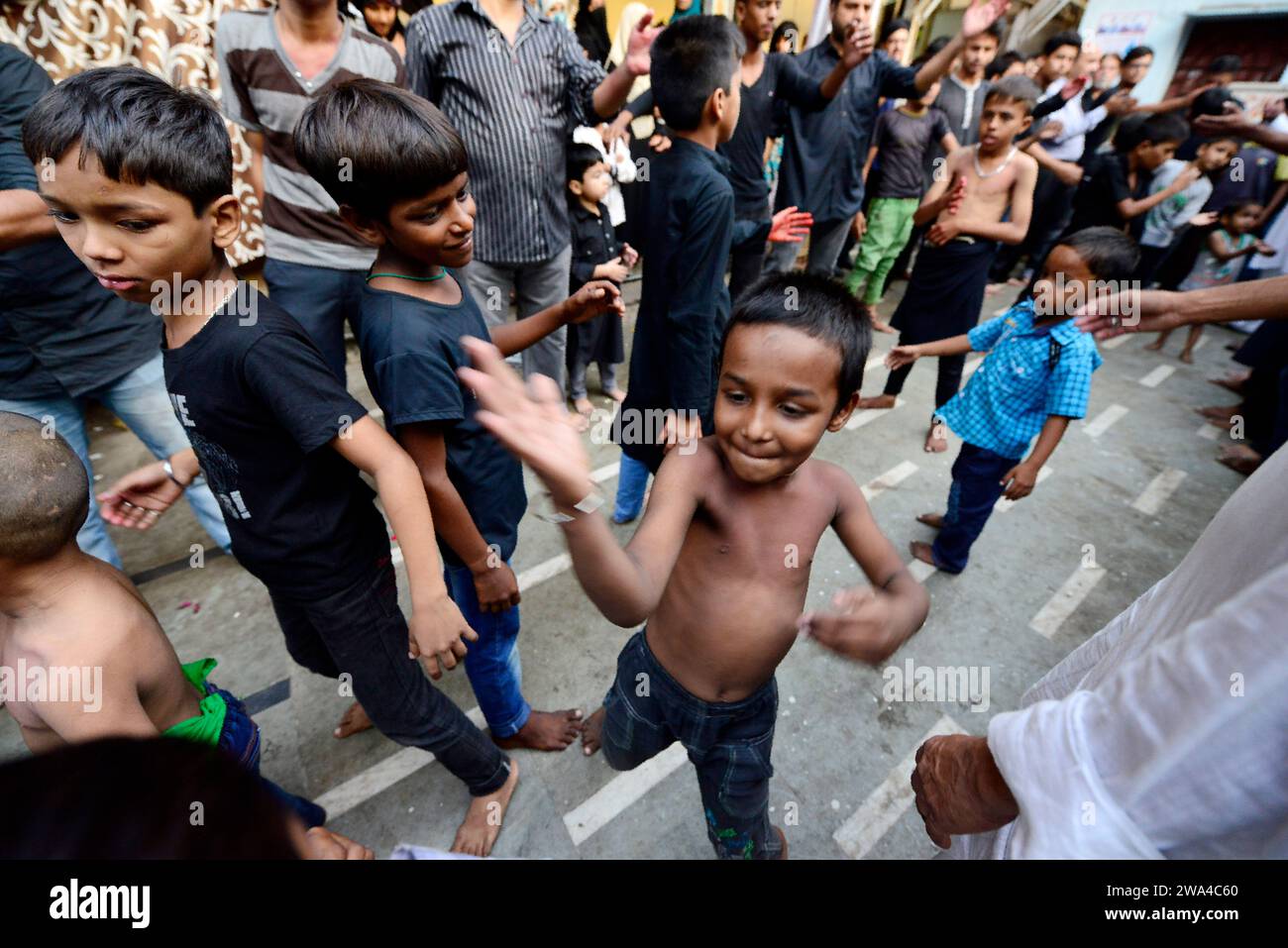 Boys participating in a festival hi-res stock photography and images ...