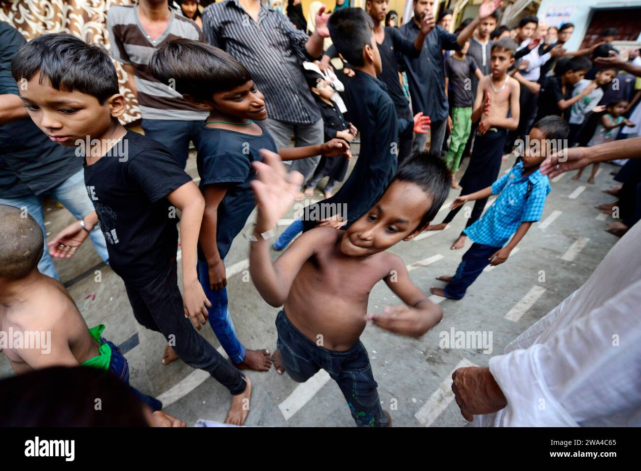 Shia men flogging themselves during the Muharram mourning festival of ...