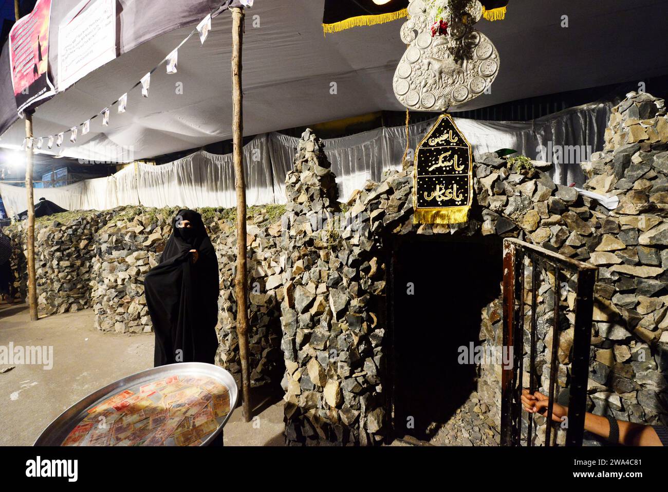 Shia Muslim pilgrims visiting sites representing the story of the ...