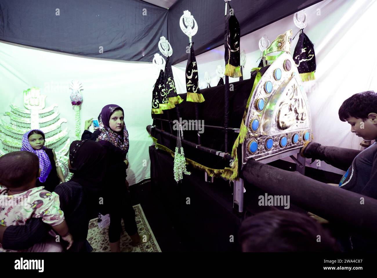 Shia Muslim pilgrims visiting sites representing the story of the ...