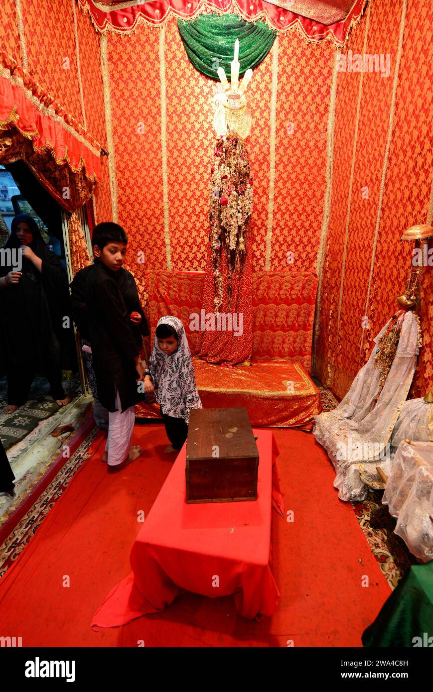 Shia Muslims visiting sites representing the story of the martyrdom of ...