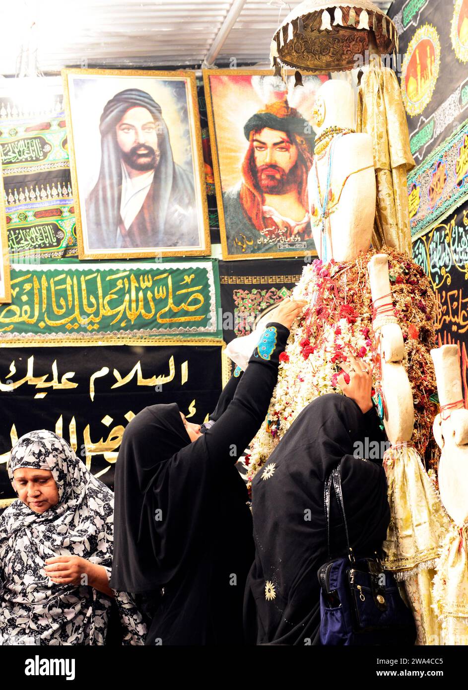 Shia Muslims visiting sites representing the story of the martyrdom of ...