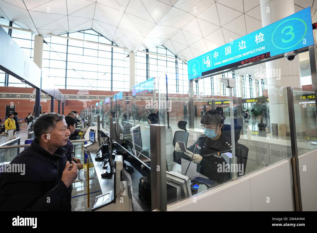 Beijing, China's Liaoning Province. 2nd Jan, 2024. Yang Huimin (R), a ...