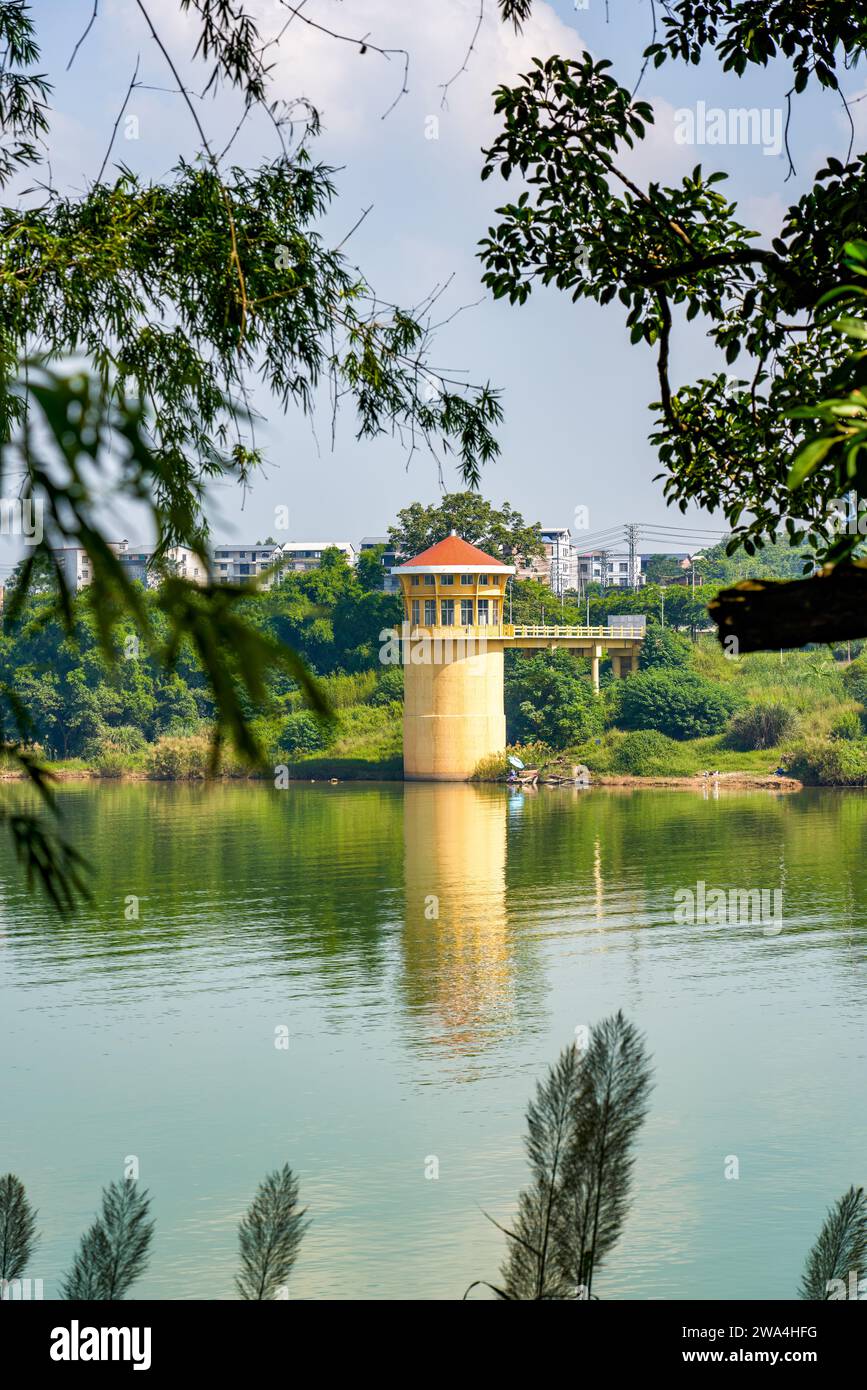 Architectural landscape of hydrological tower by the river Stock Photo ...