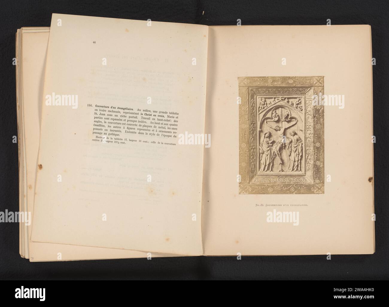 Ivory book cover of a gospeliaium with a relief of Christ on the cross ...