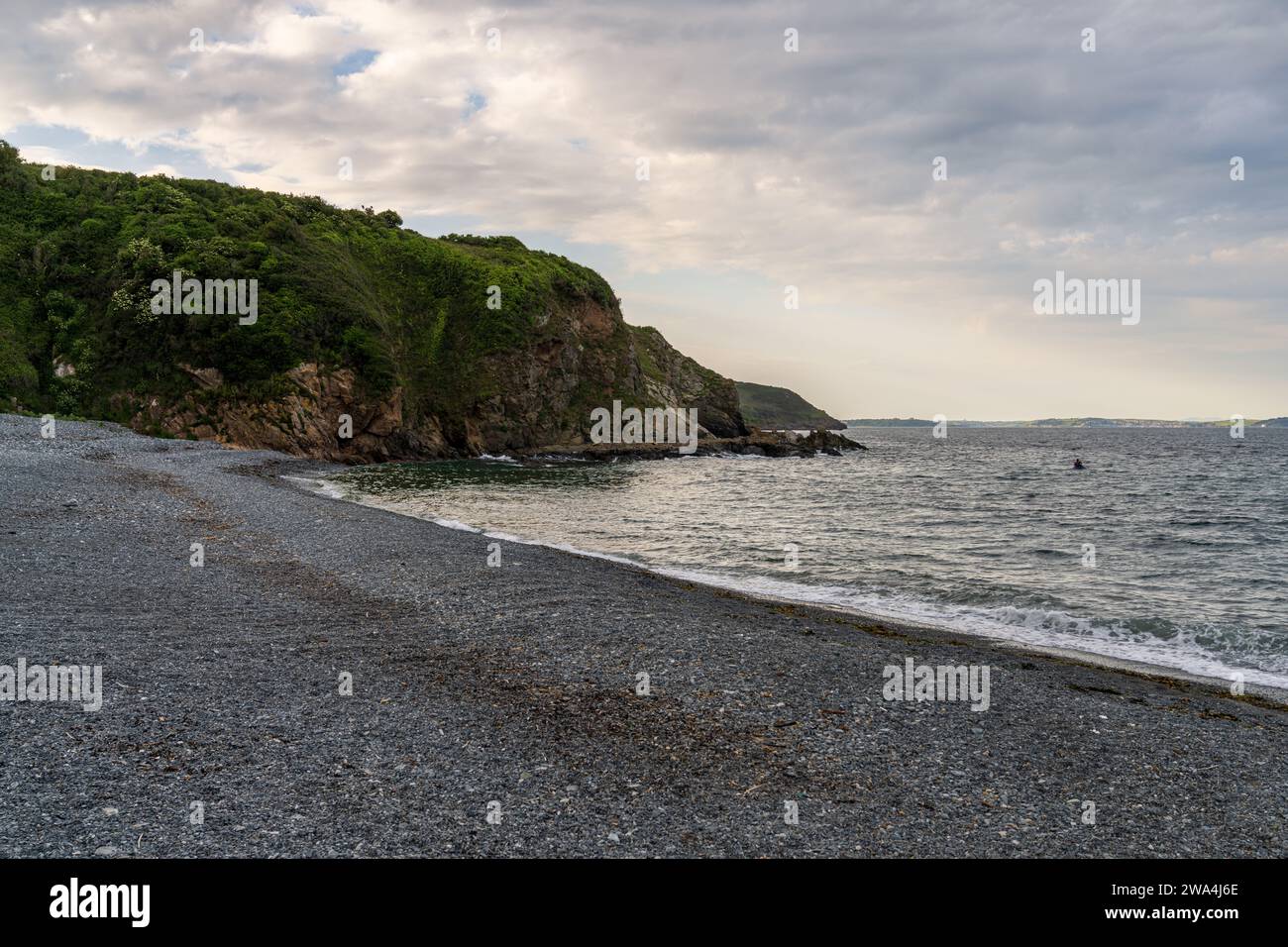 The pebble beach in Porthallow Cove, Cornwall, England, UK Stock Photo ...