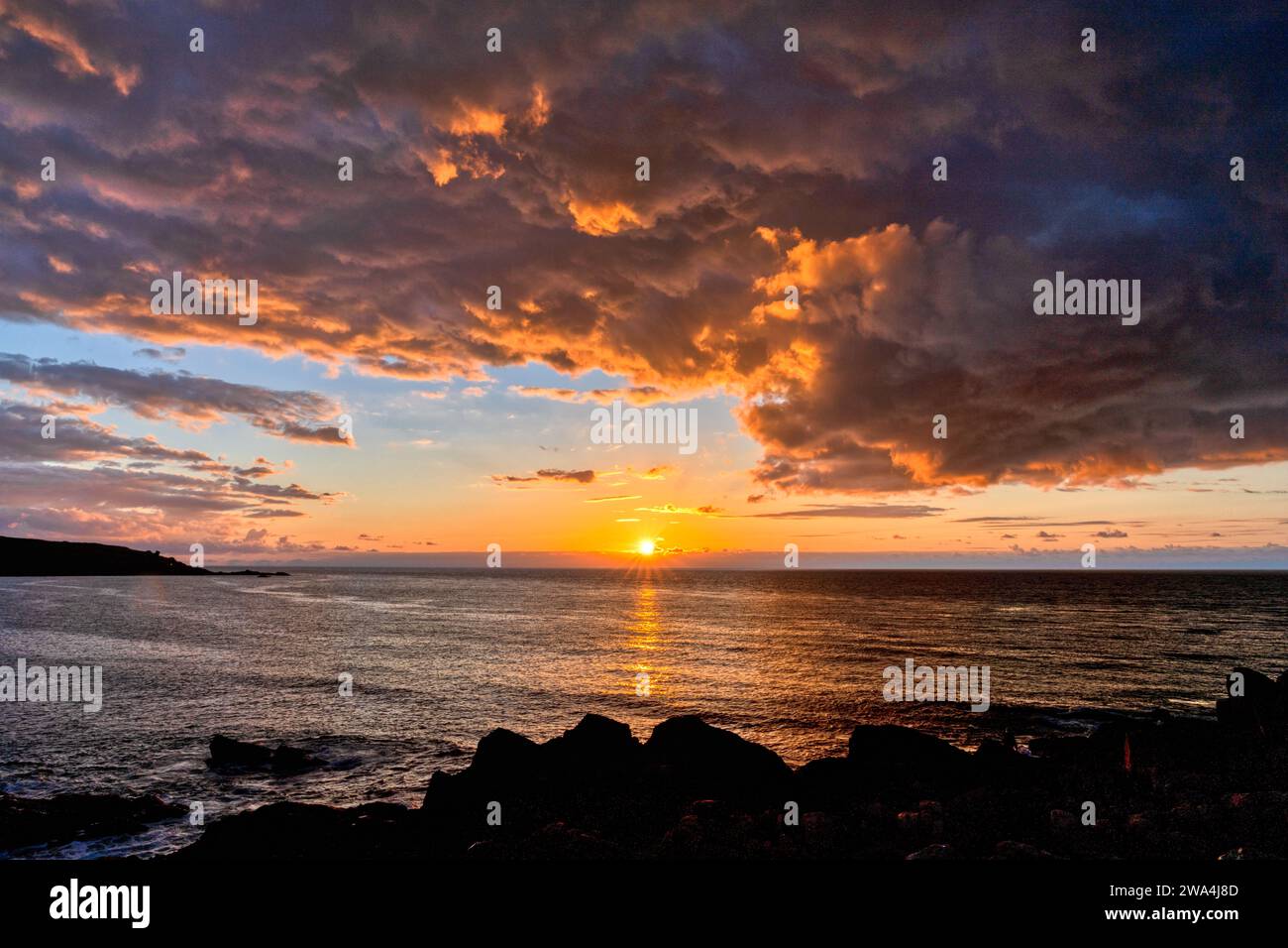 Sunset with dramatic clouds near Porthmeor Beach in St Ives, Cornwall ...