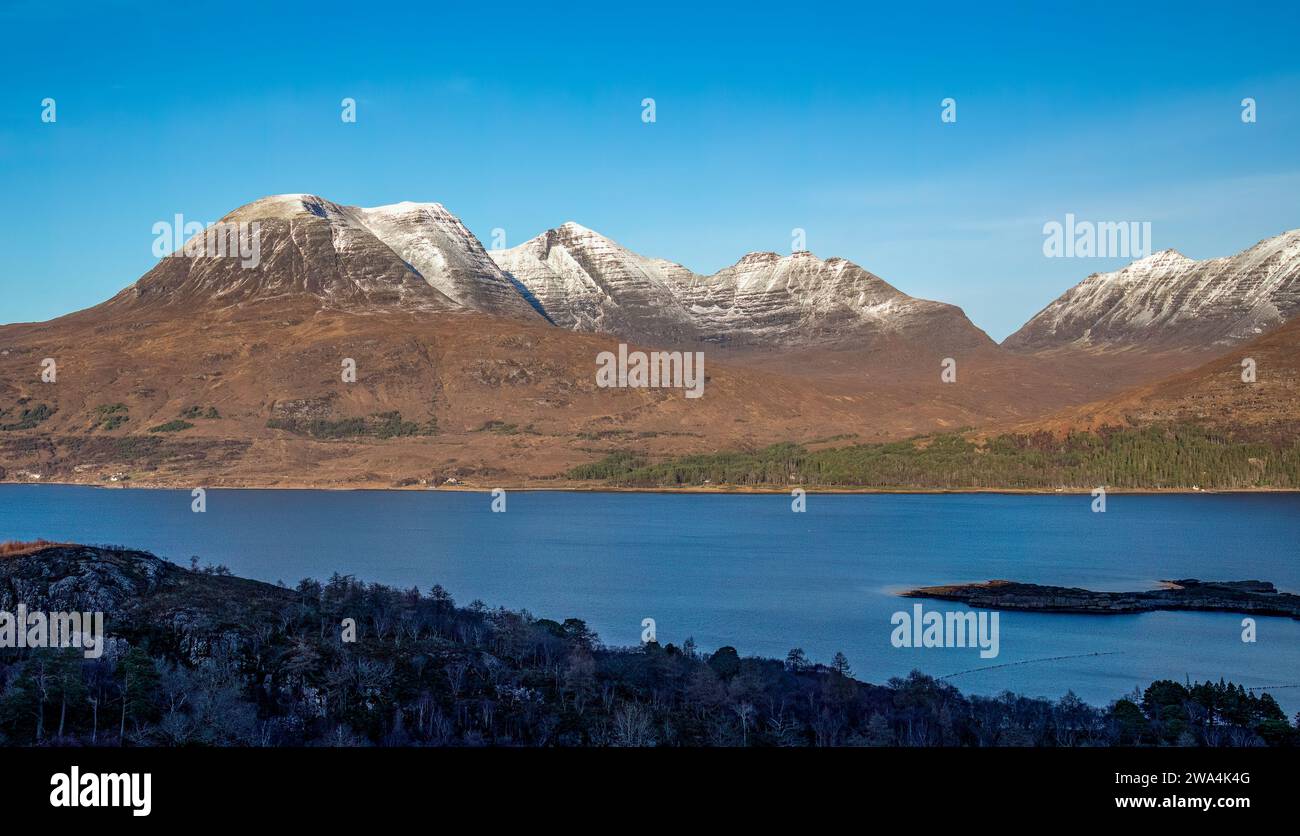 Beautiful view of the scotish Munro Beinn Alligin across Loch Torridon ...