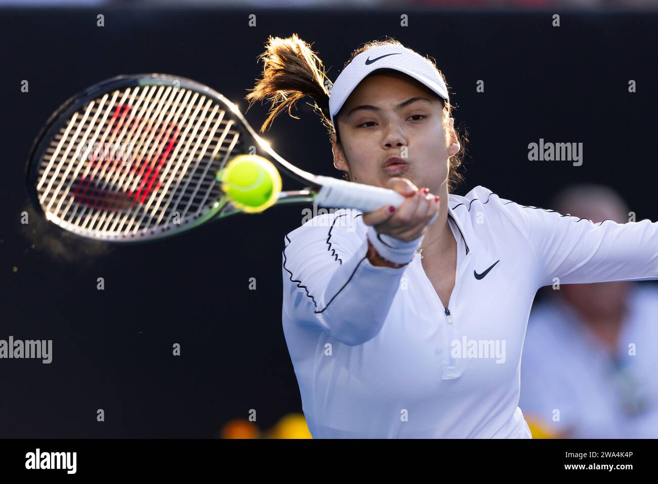 Emma Raducanu of Britain hits a return during her singles match at the ...