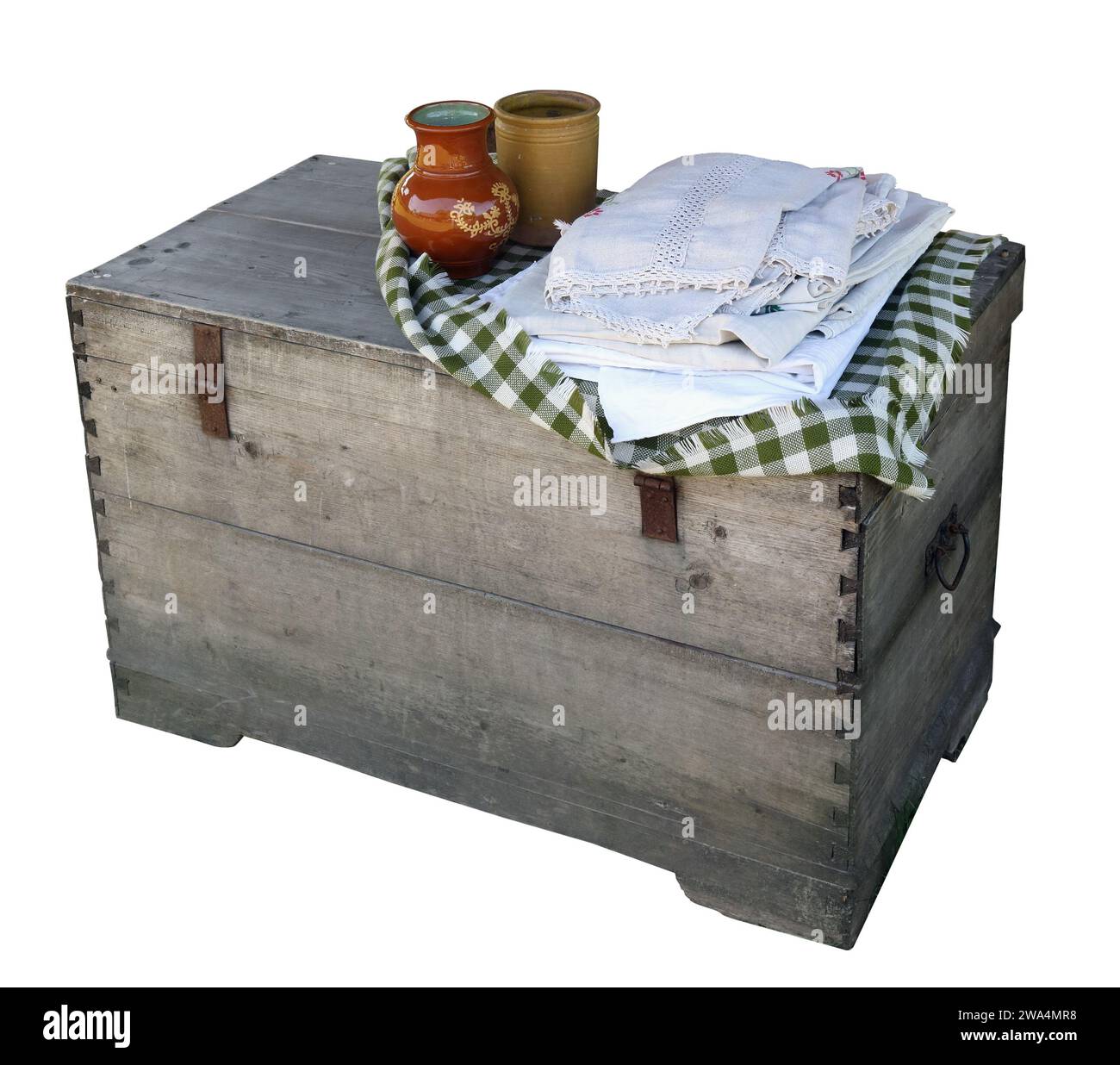 Homemade wooden chest, clay jugs and linen isolated Stock Photo - Alamy