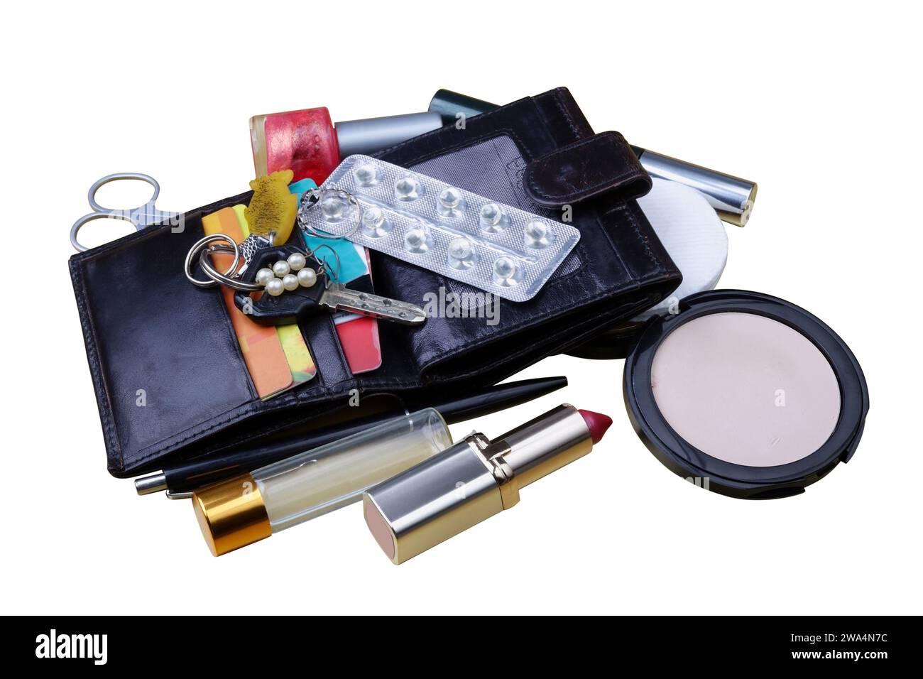 The contents of the ladies handbag. Isolated on white Stock Photo - Alamy
