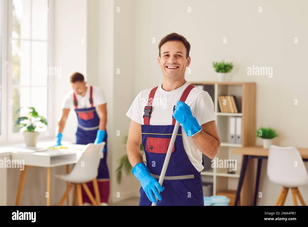 Male cleaner overall hi-res stock photography and images - Alamy