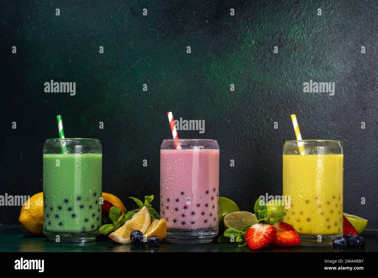 Set of three colorful summer bubble tea, bright creamy pearl tea or ...