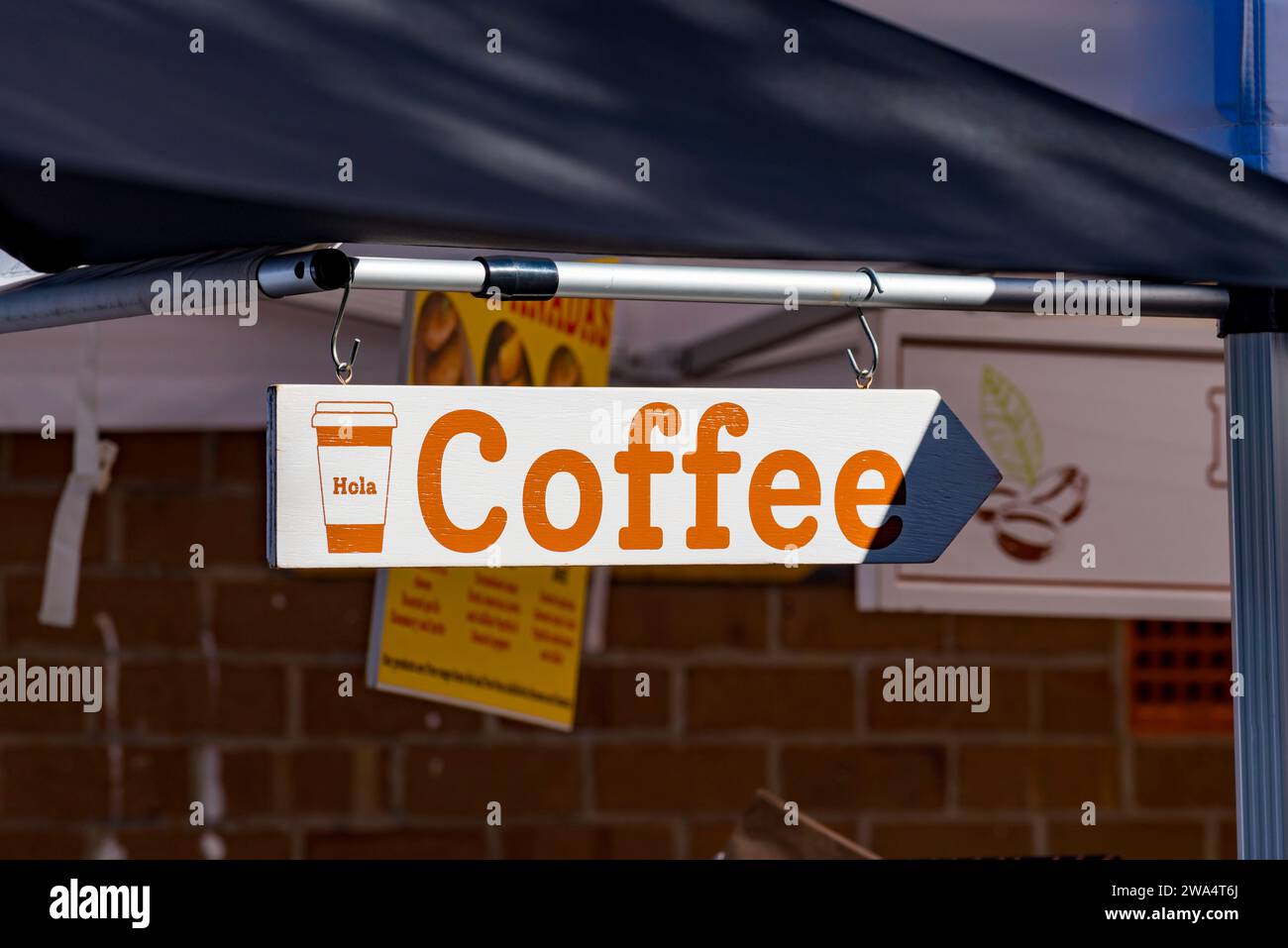 A coffee sign hanging at a stall in the Bondi Farmers Market in Sydney ...