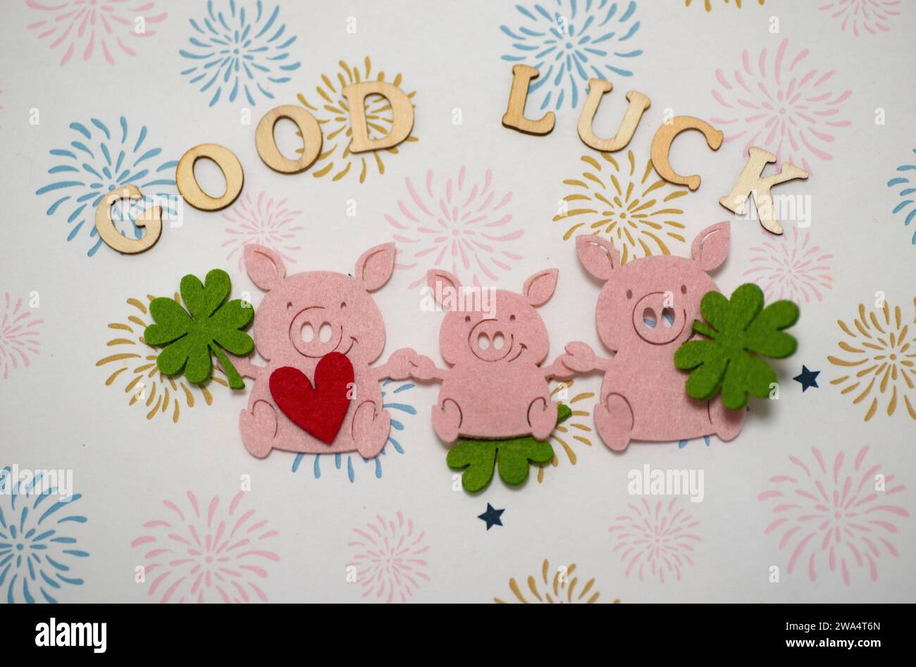 Pink lucky pigs with hearts and or lucky clovers wish you all the best ...