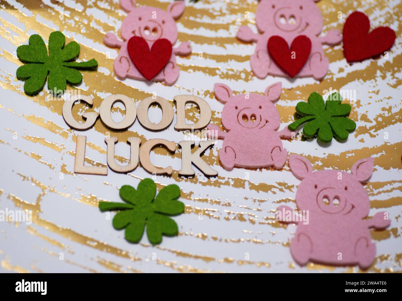 Pink lucky pigs with hearts and or lucky clovers wish you all the best ...